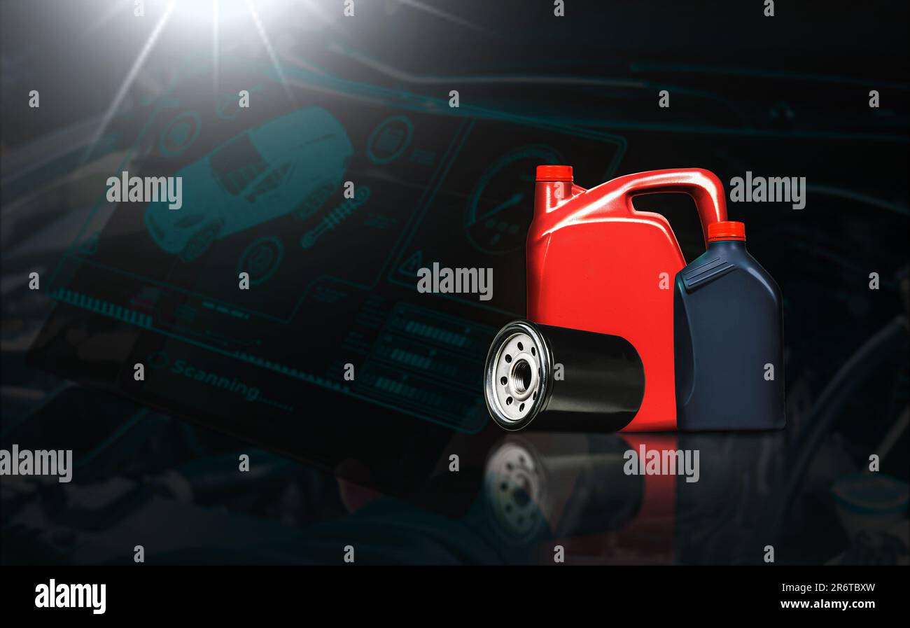 Motor oil canister with oil filter on dark background with copy space ...