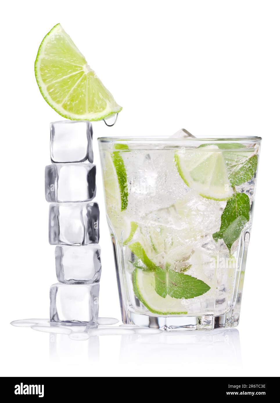Cold fresh lemonade. Ice cubes and glass on a white background and with soft shadow Stock Photo ...