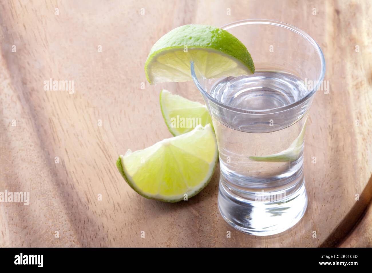 shot glass filled with clear cold alcohol Stock Photo - Alamy