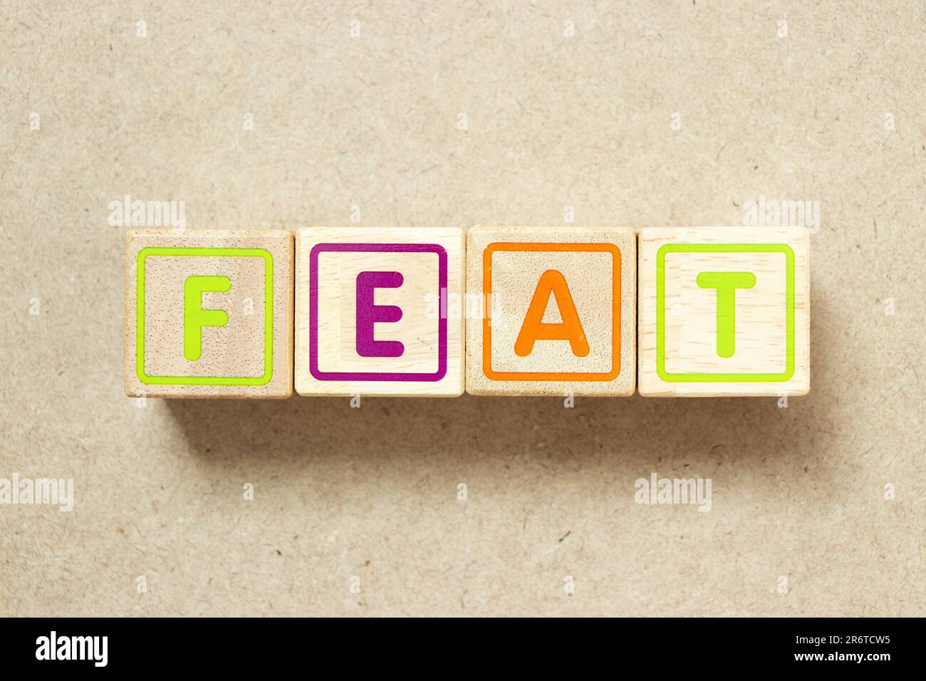 Wooden alphabet letter block in word feat on wood background Stock ...