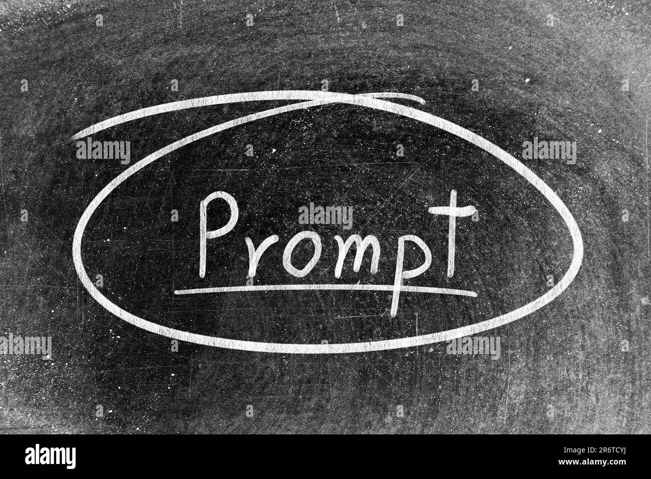 White chalk hand writing in word prompt and circle shape on blackboard ...