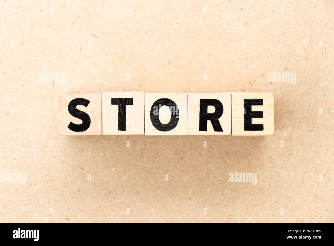 Alphabet letter block in word store on wood background Stock Photo - Alamy
