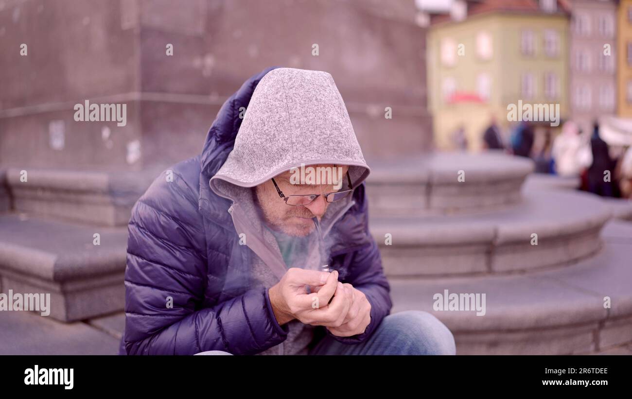 Warsaw, Poland. 11th June, 2023. Adult man Ð² Ð¾Ñ‡ÐºÐ°Ñ… sitting on ...