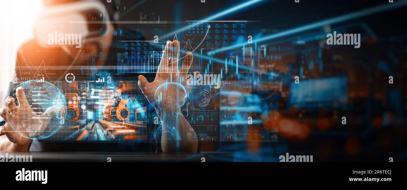 Engineer manager wearing virtual reality headset uses VR technology checking and control ...