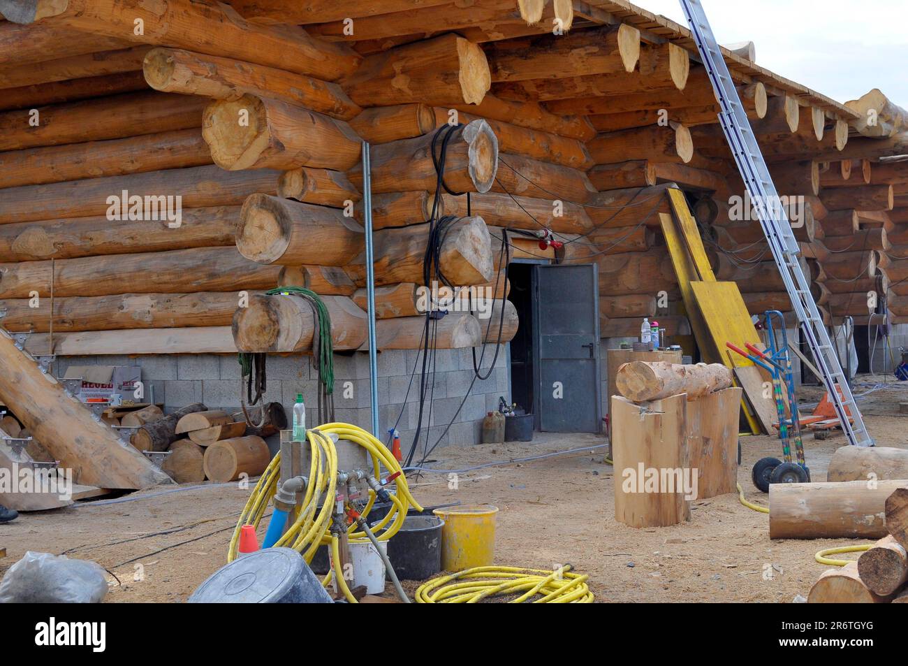 Factory building made of wooden beams under construction, wood from ...
