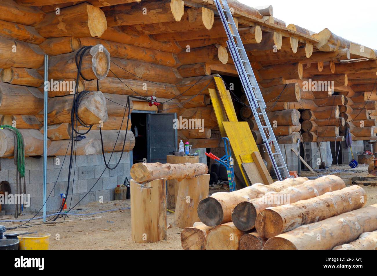 Factory building made of wooden beams under construction, wood from ...