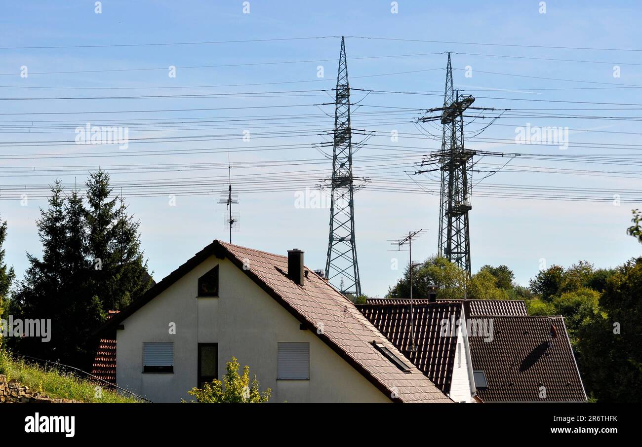 Overhead power lines, power pylons, power pylons with residential ...