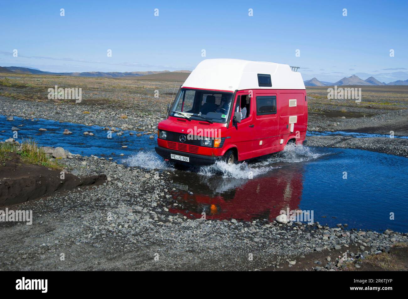 Motorhome passes through ford, F905, highland track Stock Photo - Alamy