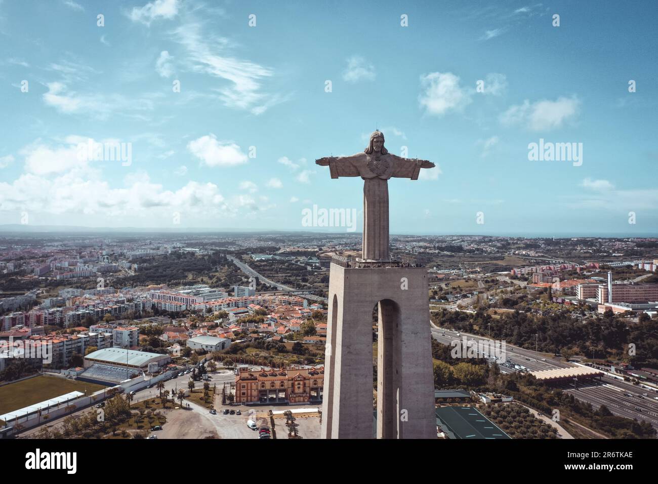 Drone soars, capturing the Christ the King statue and the iconic red ...