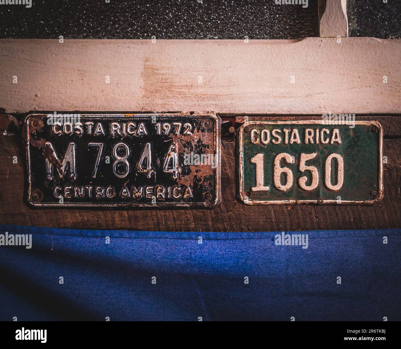 Two Costa Rican car plates proudly displayed on a wall. Emblematic ...