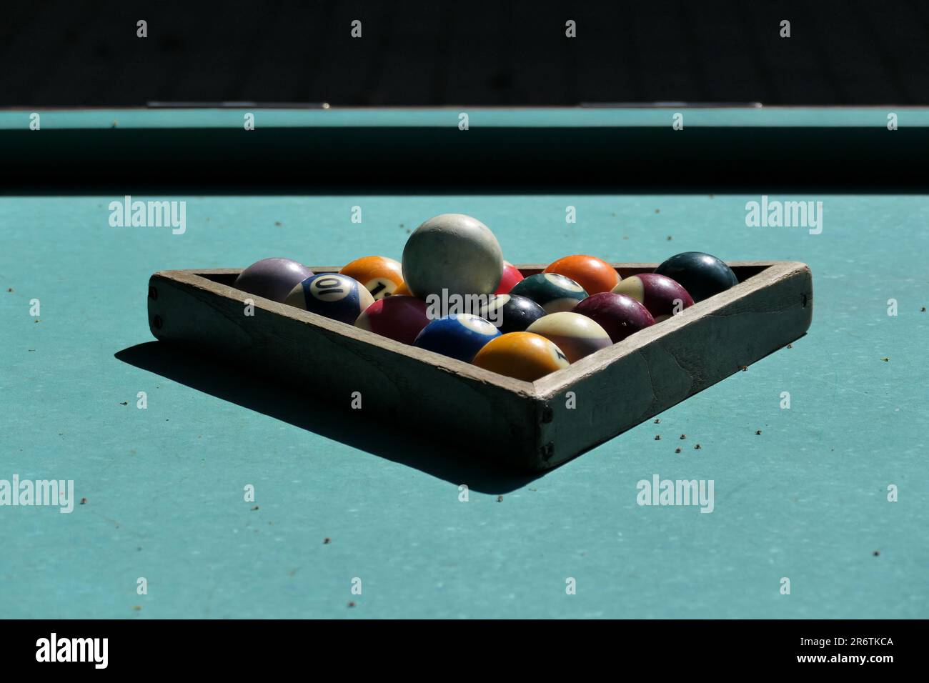 billiard balls on the pool table outdoors Stock Photo - Alamy