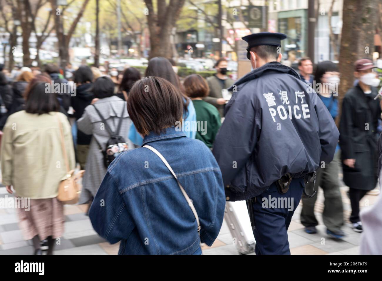 Tokyo, Japan. 21st Mar, 2023. A Tokyo Metropolitan Police Officer walks ...