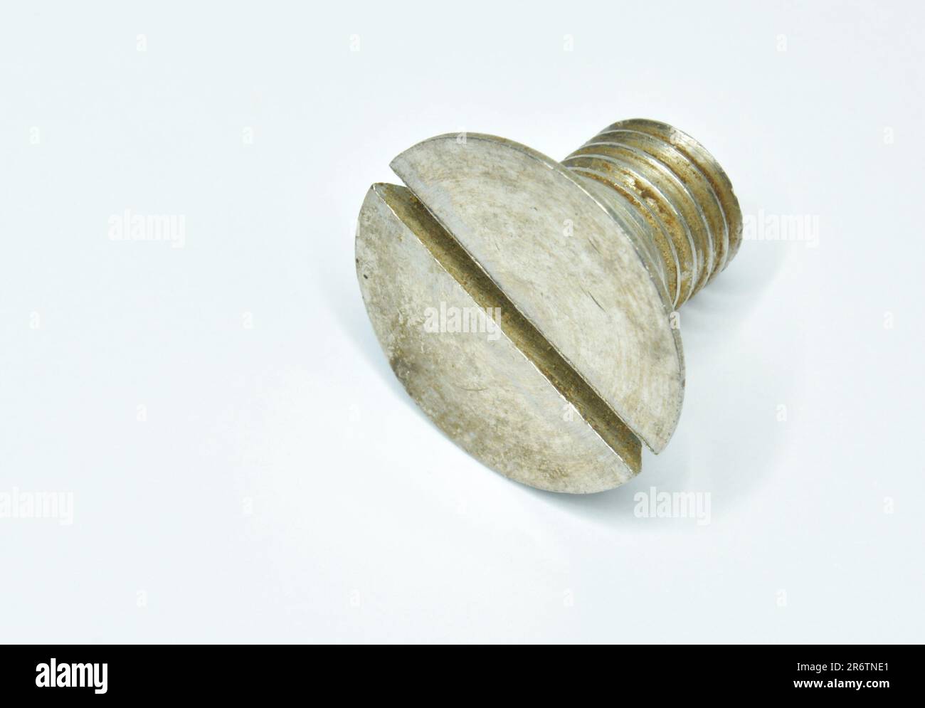 Old short metal screw with square head on white background Stock Photo ...
