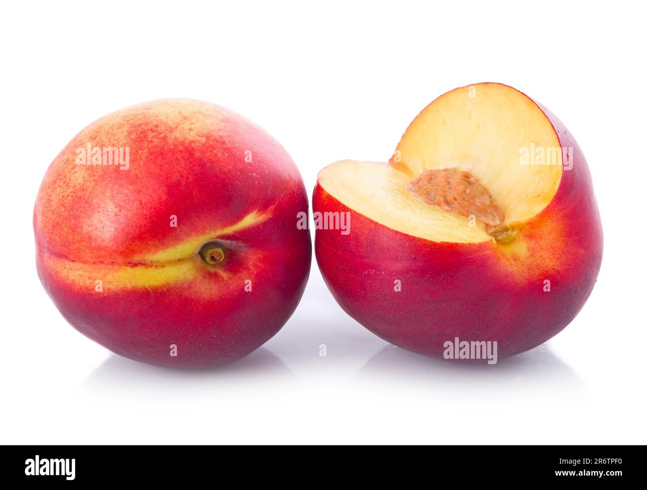 Fresh peach fruits with cut isolated on white background Stock Photo ...