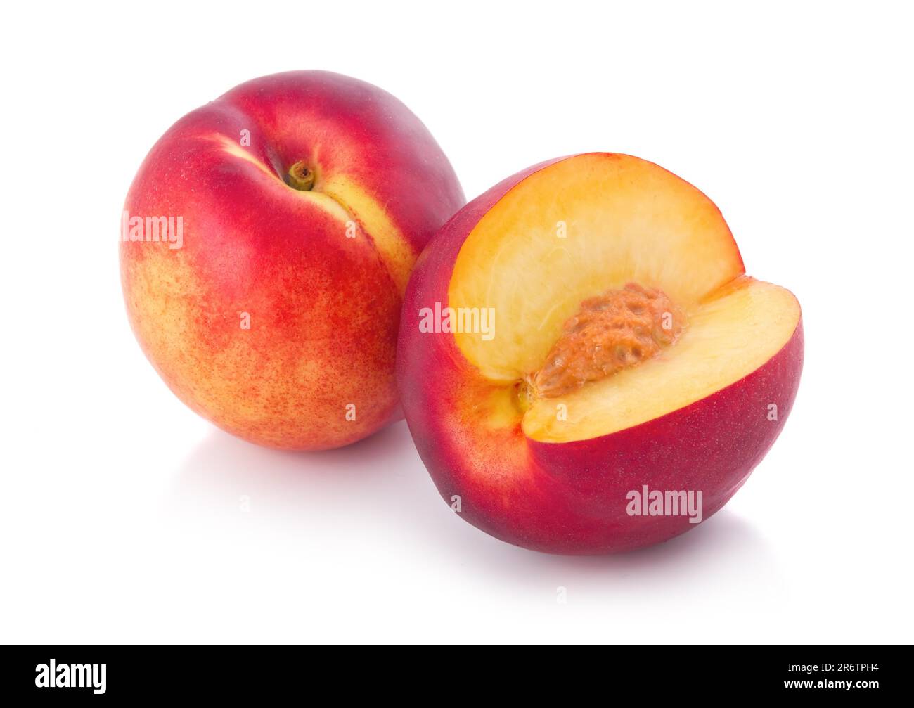 Fresh peach fruits with cut isolated on white background Stock Photo ...