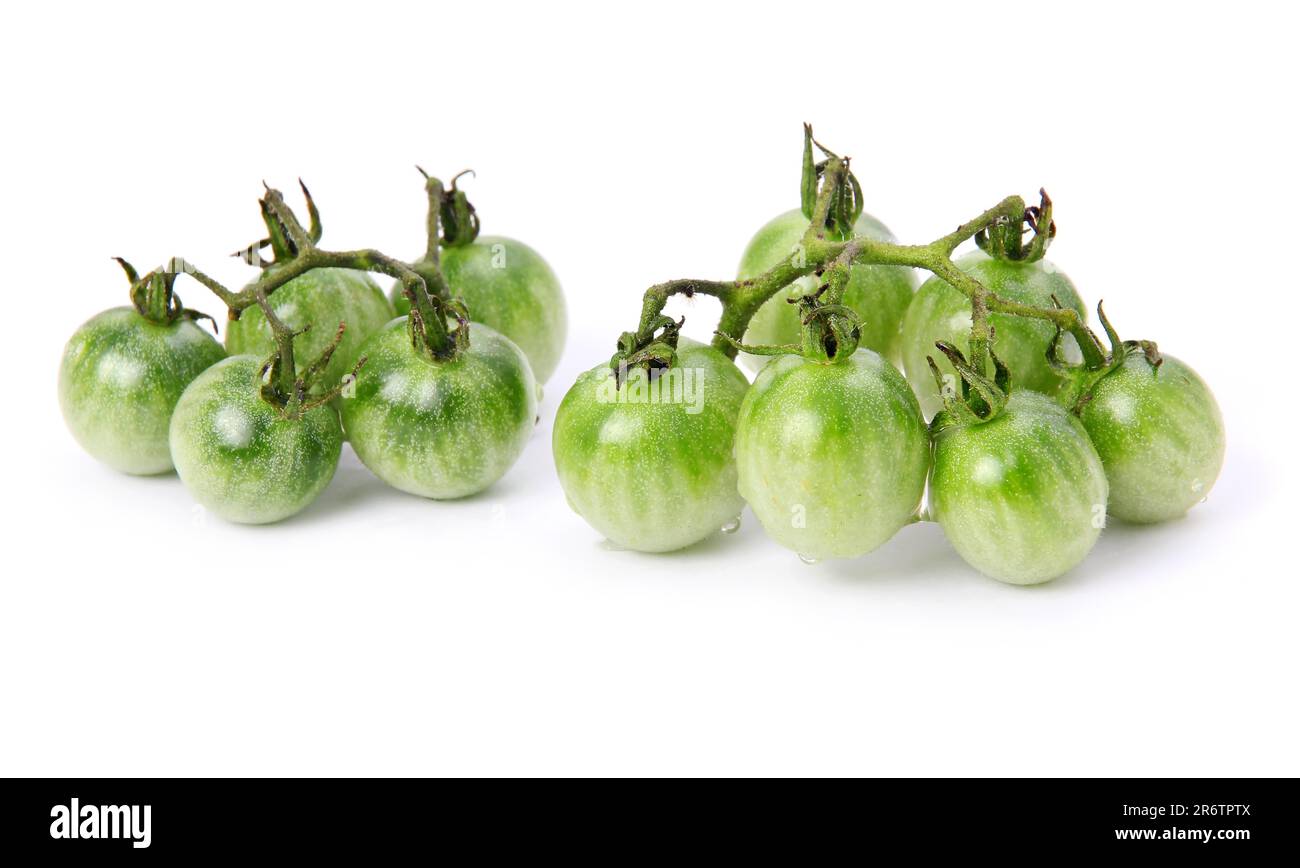 Green ripe tomatoes vegetable isolated on white background Stock Photo ...