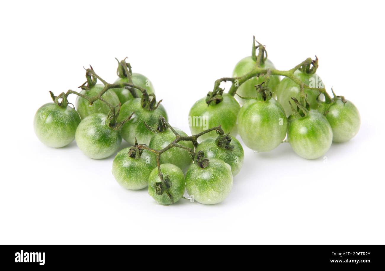 Green ripe tomatoes vegetable isolated on white background Stock Photo ...