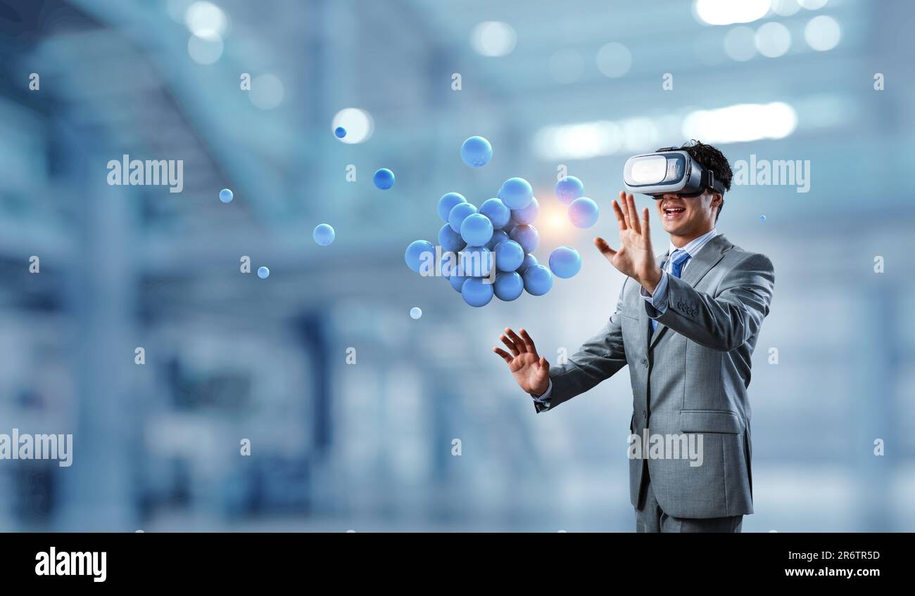 Man wearing virtual reality goggles Stock Photo - Alamy