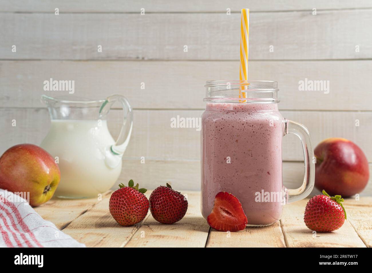 Fresh milkshake with strawberries. A glass of fresh strawberry ...