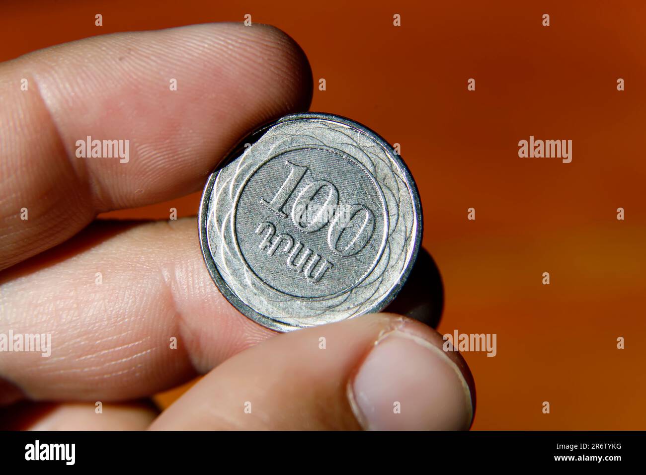 one hundred dram armenian coin between fingers - armenian coin dram ...