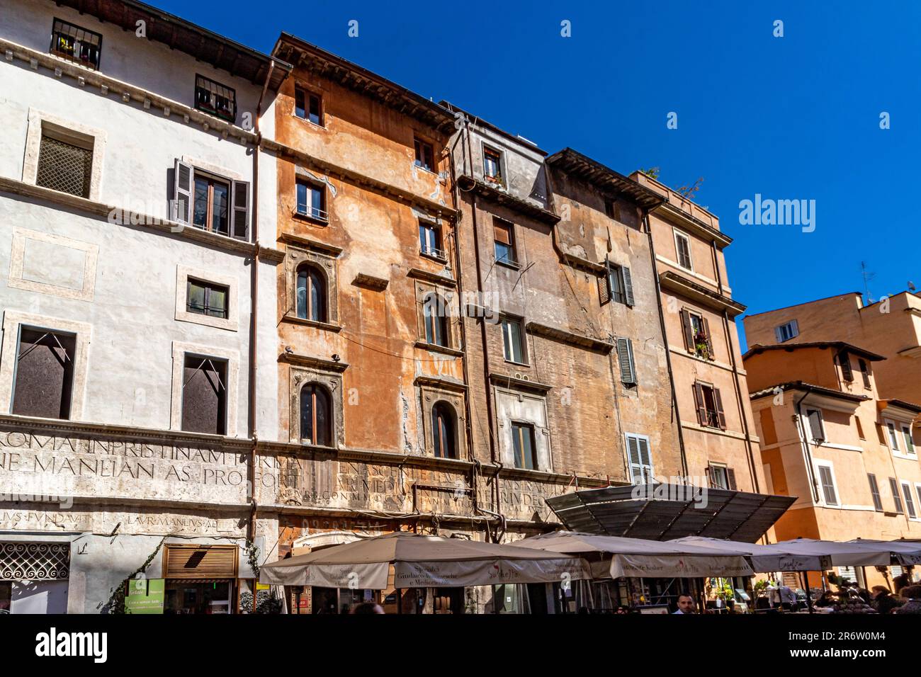 The exterior of old buildings along Via del Portico d'Ottavi in The ...