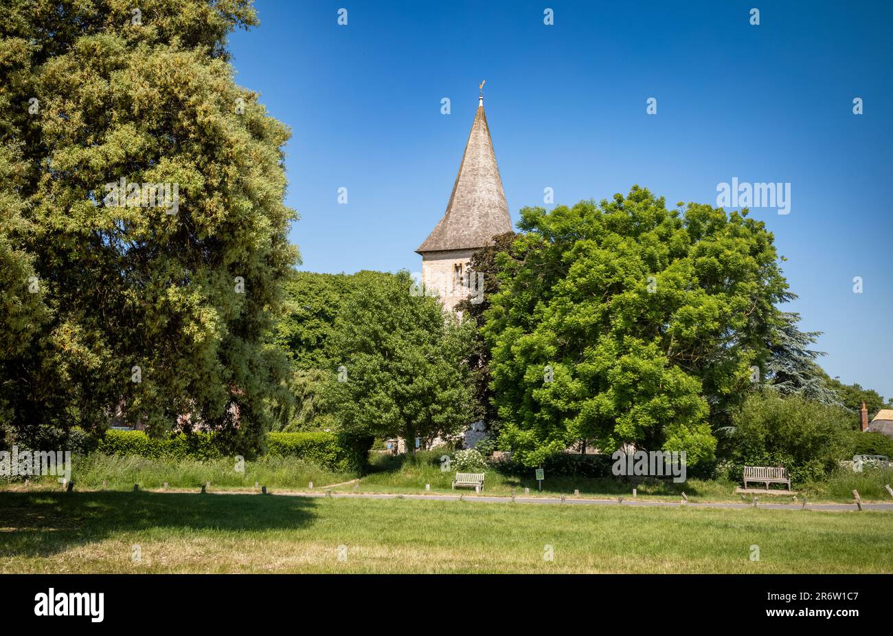 The tower and spire of Holy Trinty Church in Bosham, West Sussex, UK ...