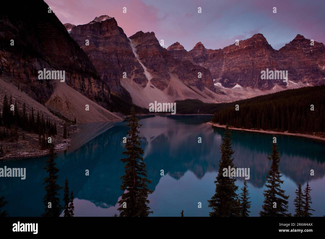 Mountains reflected in Lake Moraine, Valley of the ten Peaks, Banff ...
