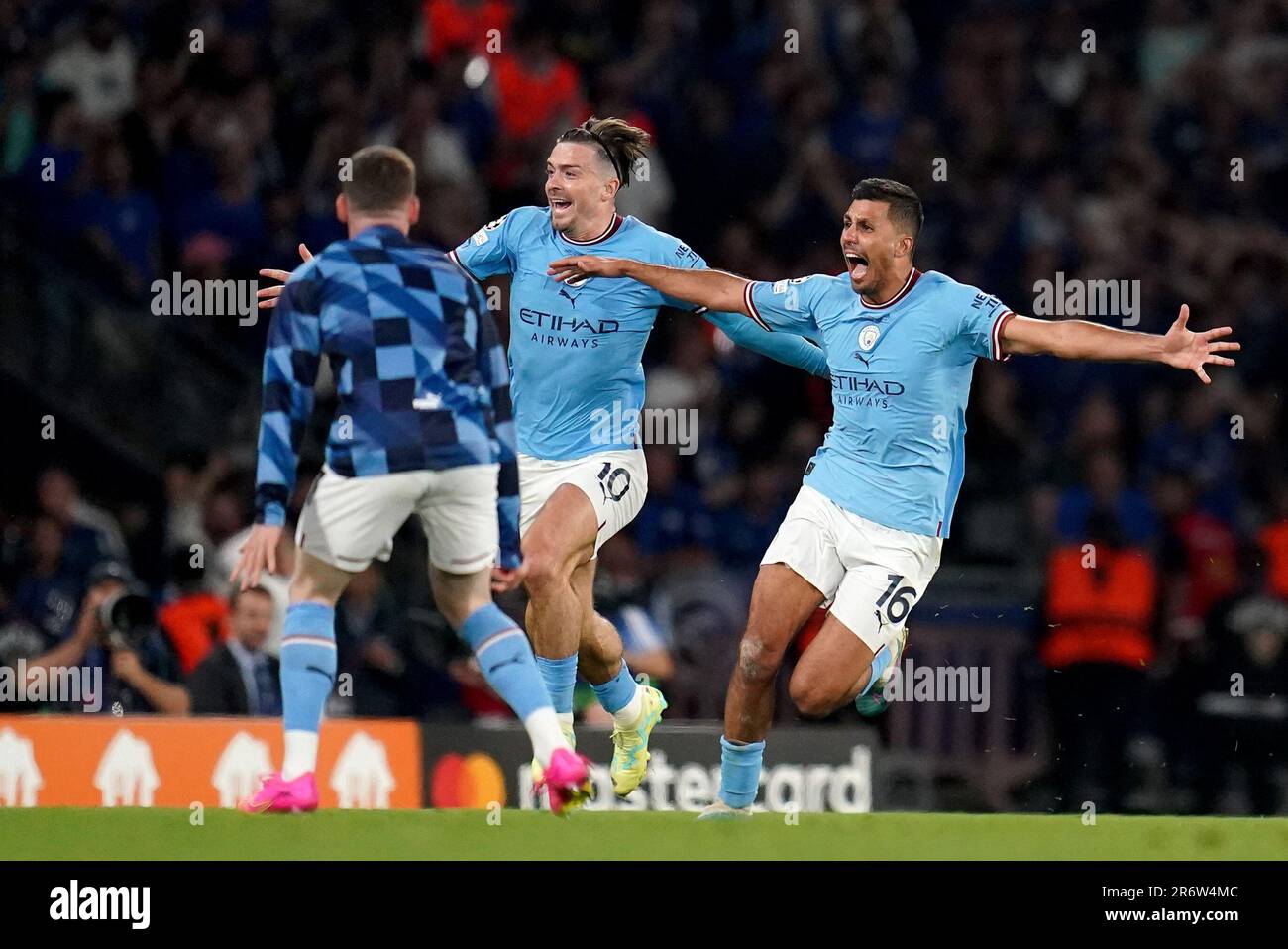 Manchester City's Jack Grealish (centre) and Rodri (right) celebrate ...