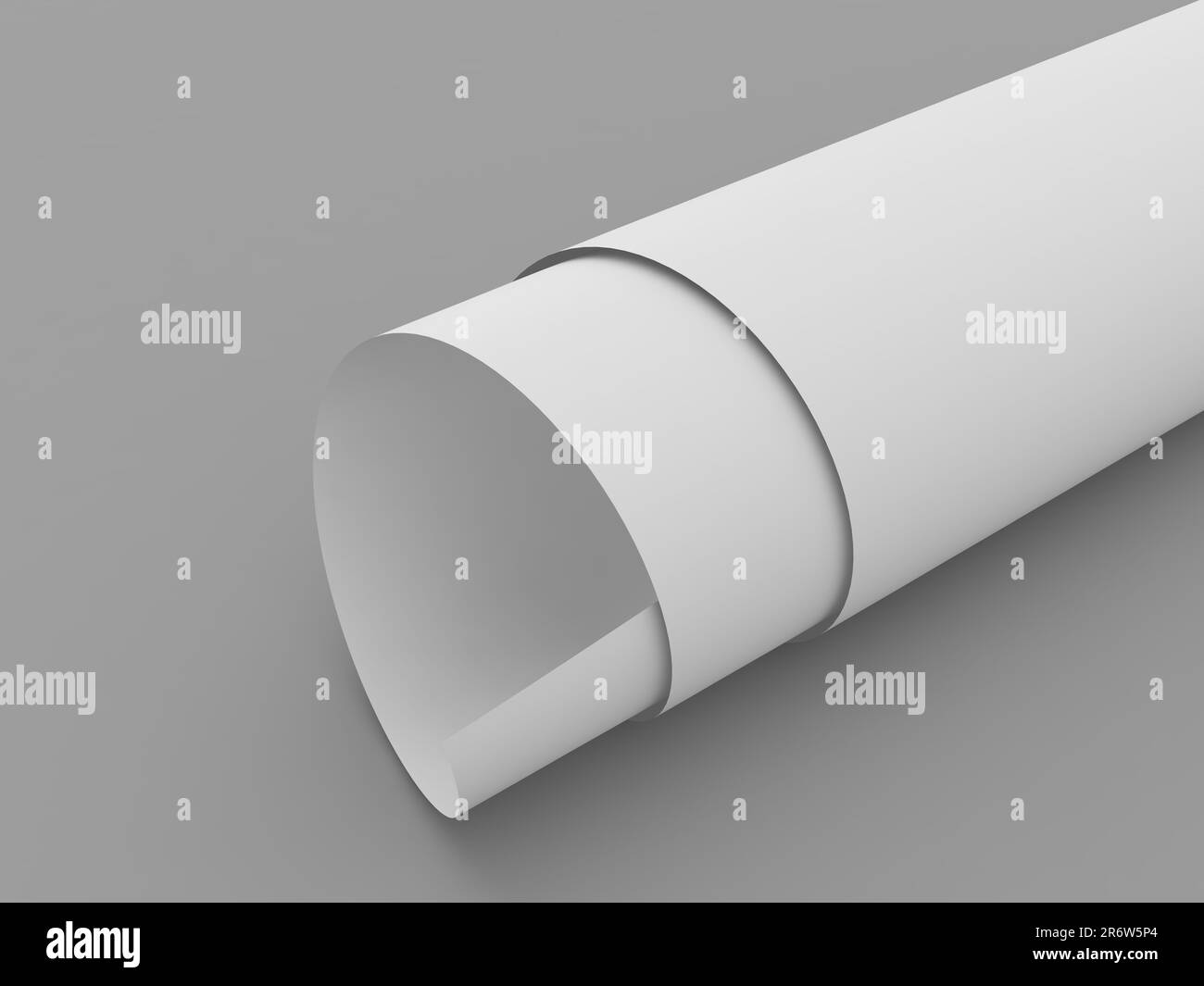 A sheet of office paper folded rolled into a roll on a gray background ...