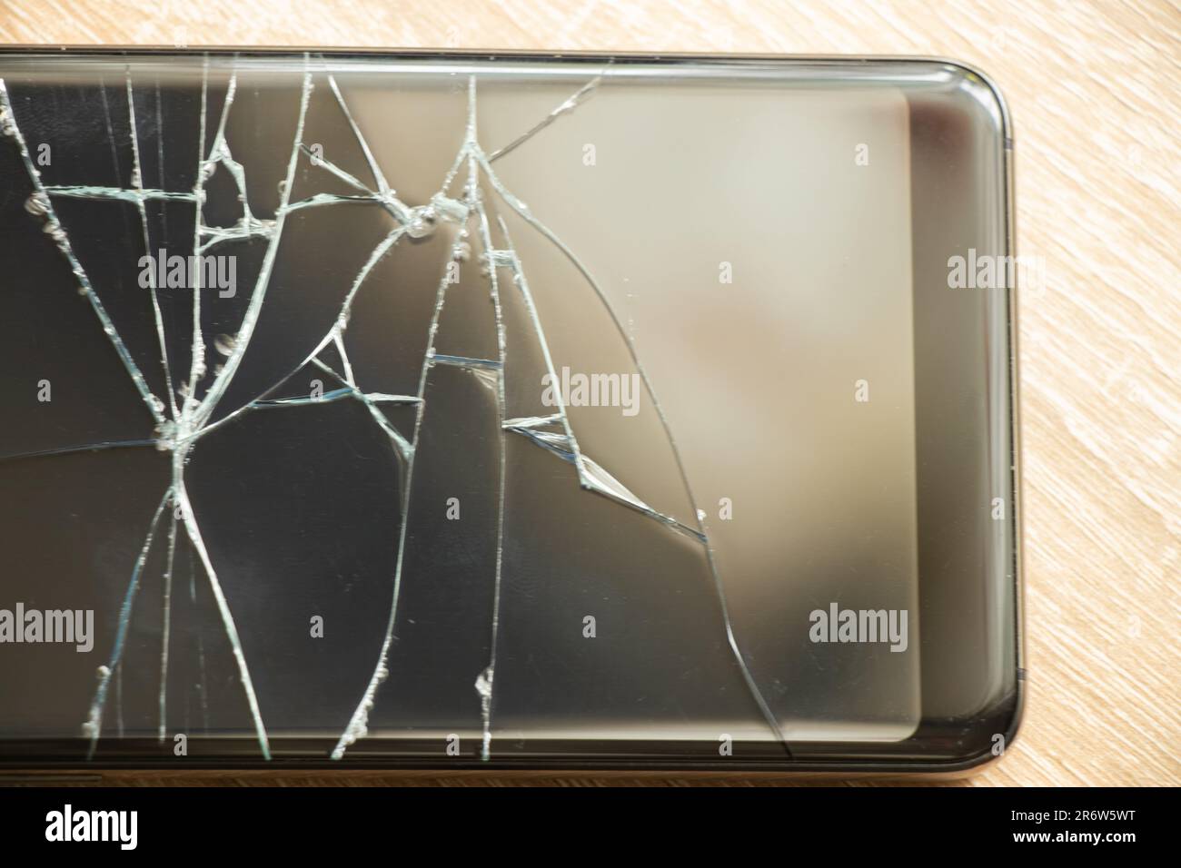 black phone with cracked screen on an isolated background Stock Photo ...