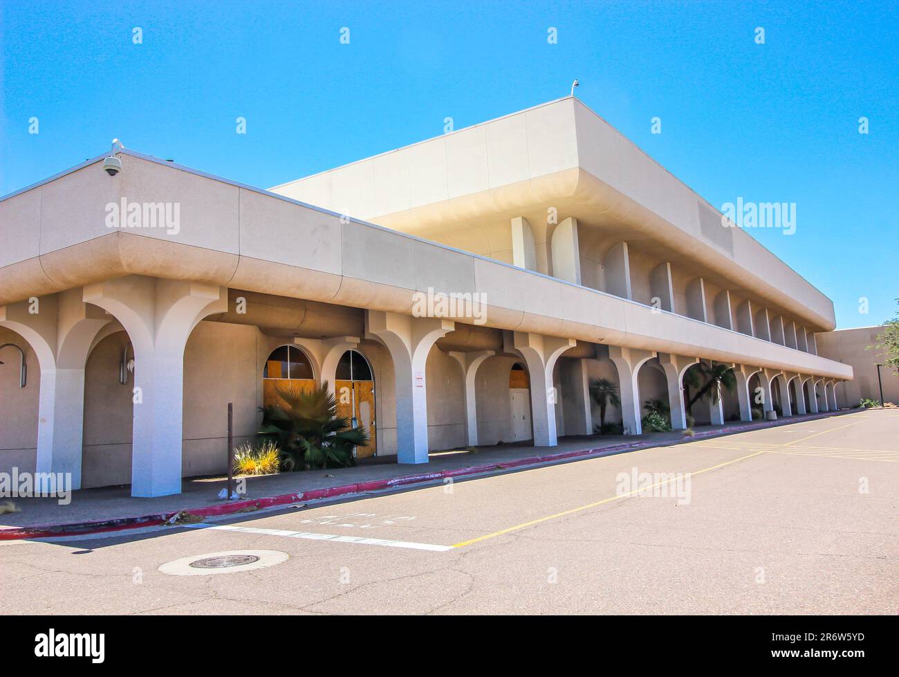 Boarded Up Doors On Abandoned Retail Store Stock Photo - Alamy