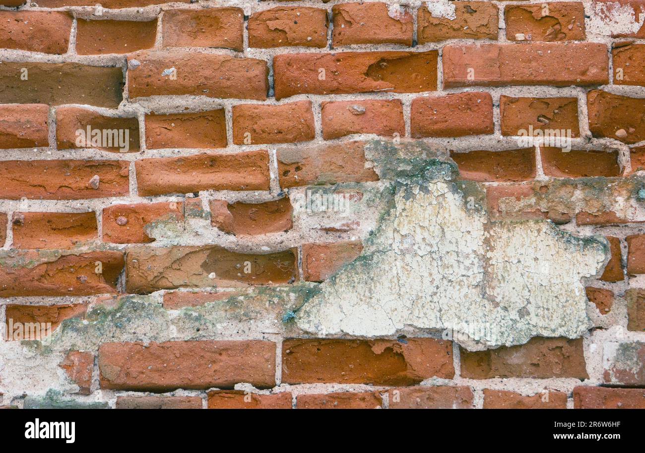 The wall is made of old ancient red brick Stock Photo - Alamy