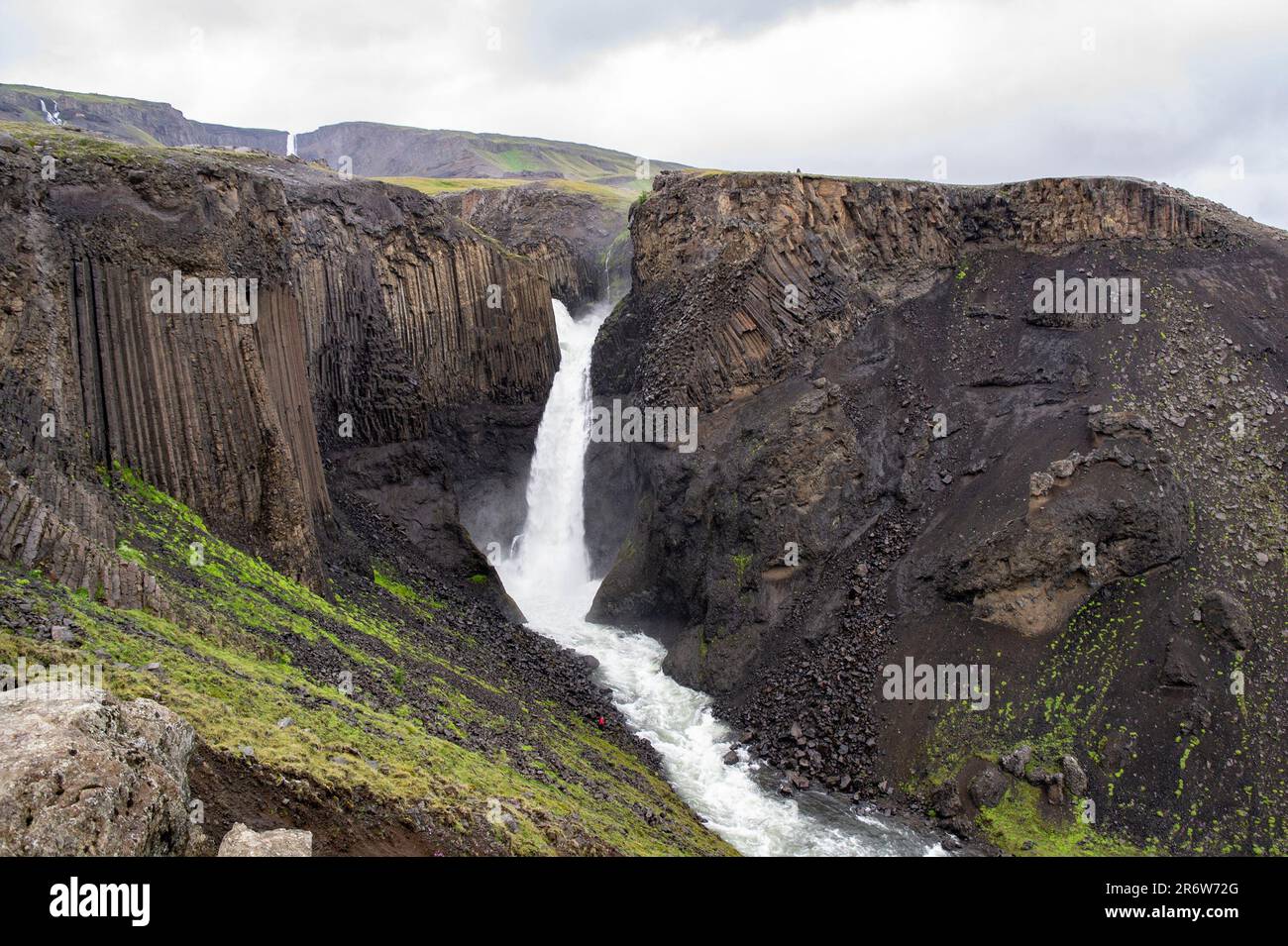 Litlanesfoss waterfall in Iceland with its basaltic geologic landscape ...
