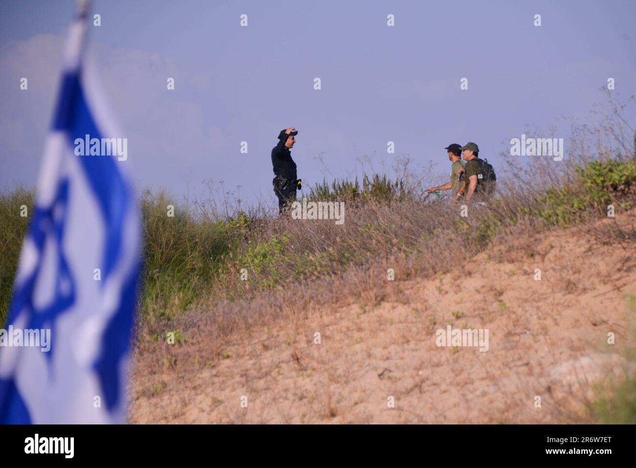 Caesarea, Israel. 11th June, 2023. An Israeli police officer stands on ...