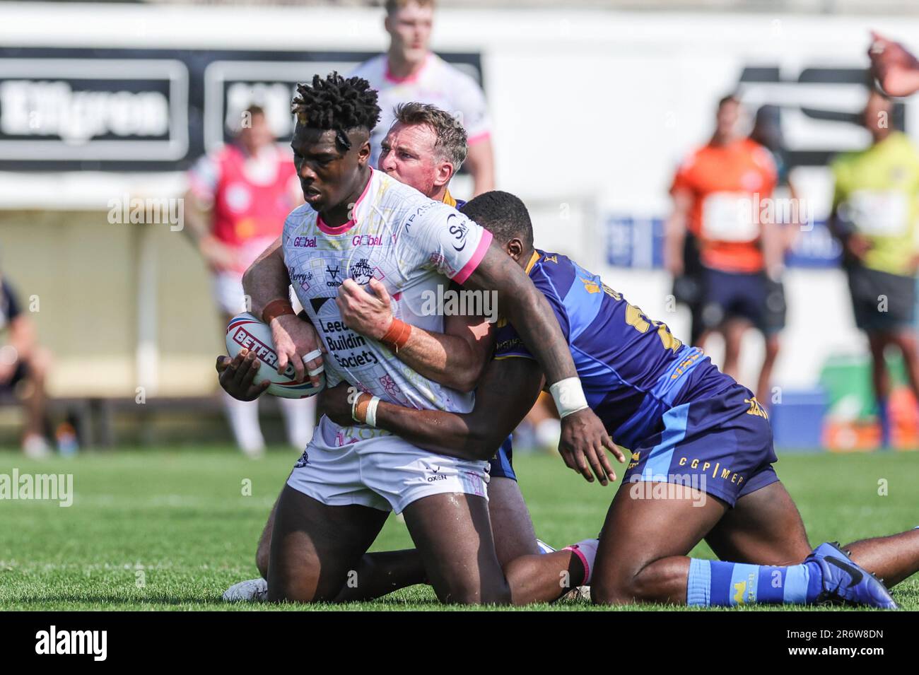 Leon Ruan #31 of Leeds Rhinos tkkSam Eseh #25of Wakefield Trinity ...
