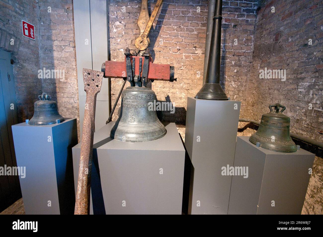 Old bells on display inside the Belfort civic tower, Bruges, Flanders ...