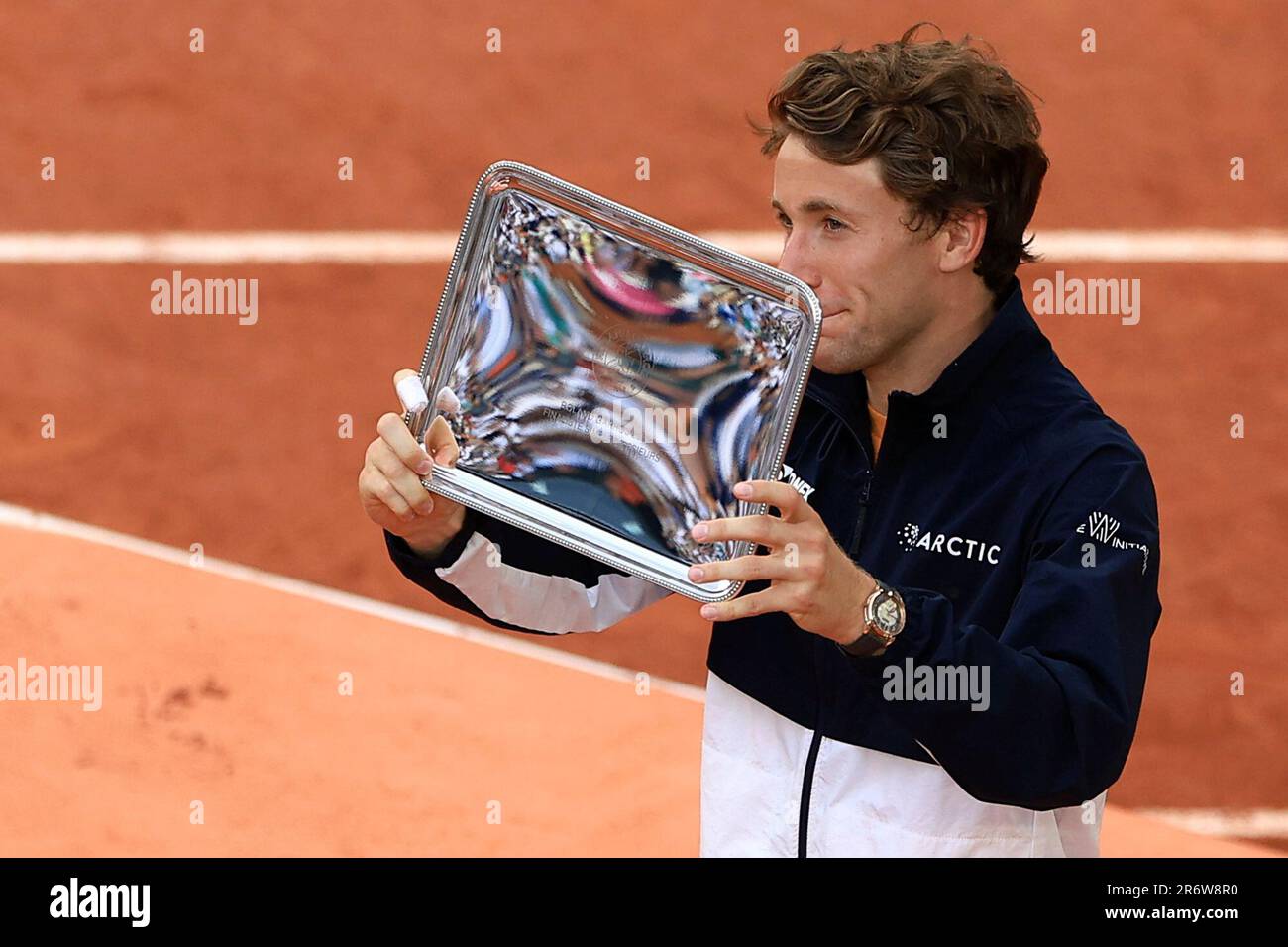 Norway's Casper Ruud holds the runner-up trophy after he lost the final ...