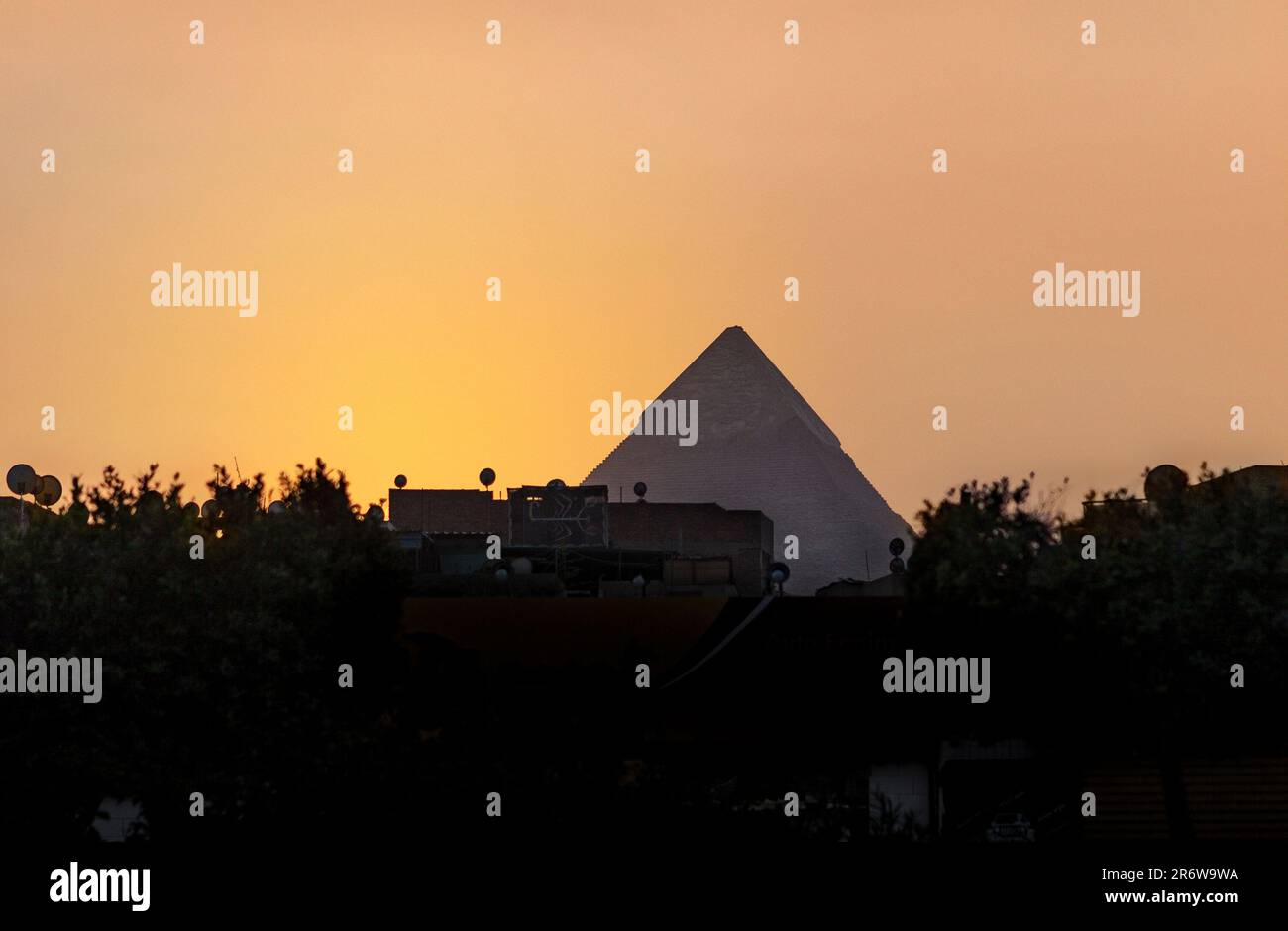 Silhouette of the pyramid of Khafre at dusk, Cairo, Egypt Stock Photo ...