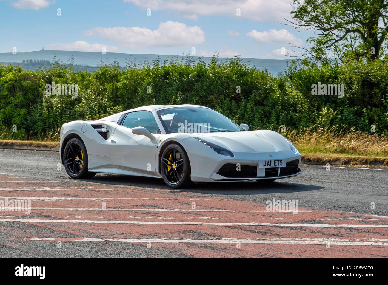 A January 2017 white FERRARI 488 at the Classic & Performance Motor ...