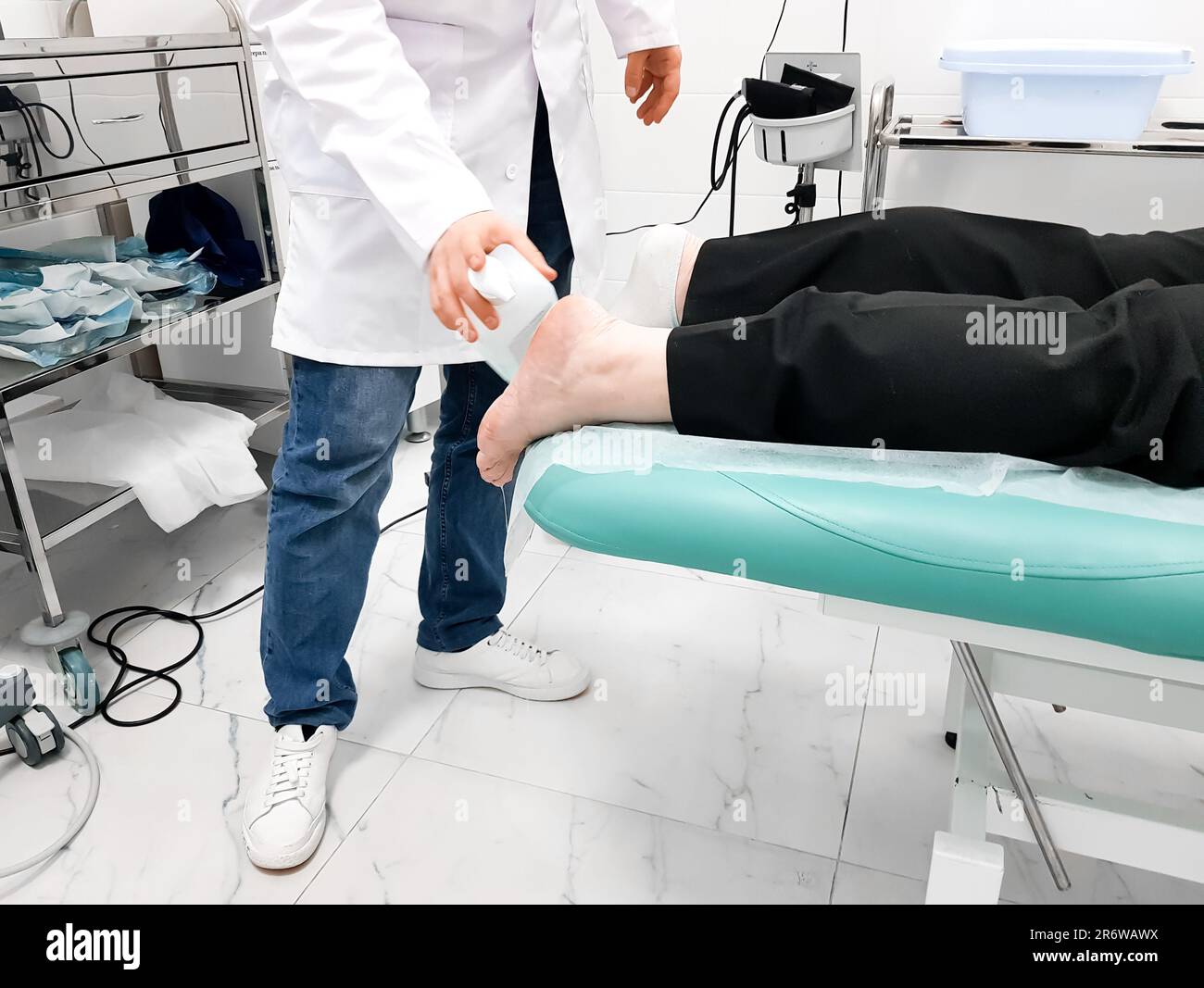 Extracorporeal shock wave therapy ESWT of heel. Visit to office of ...