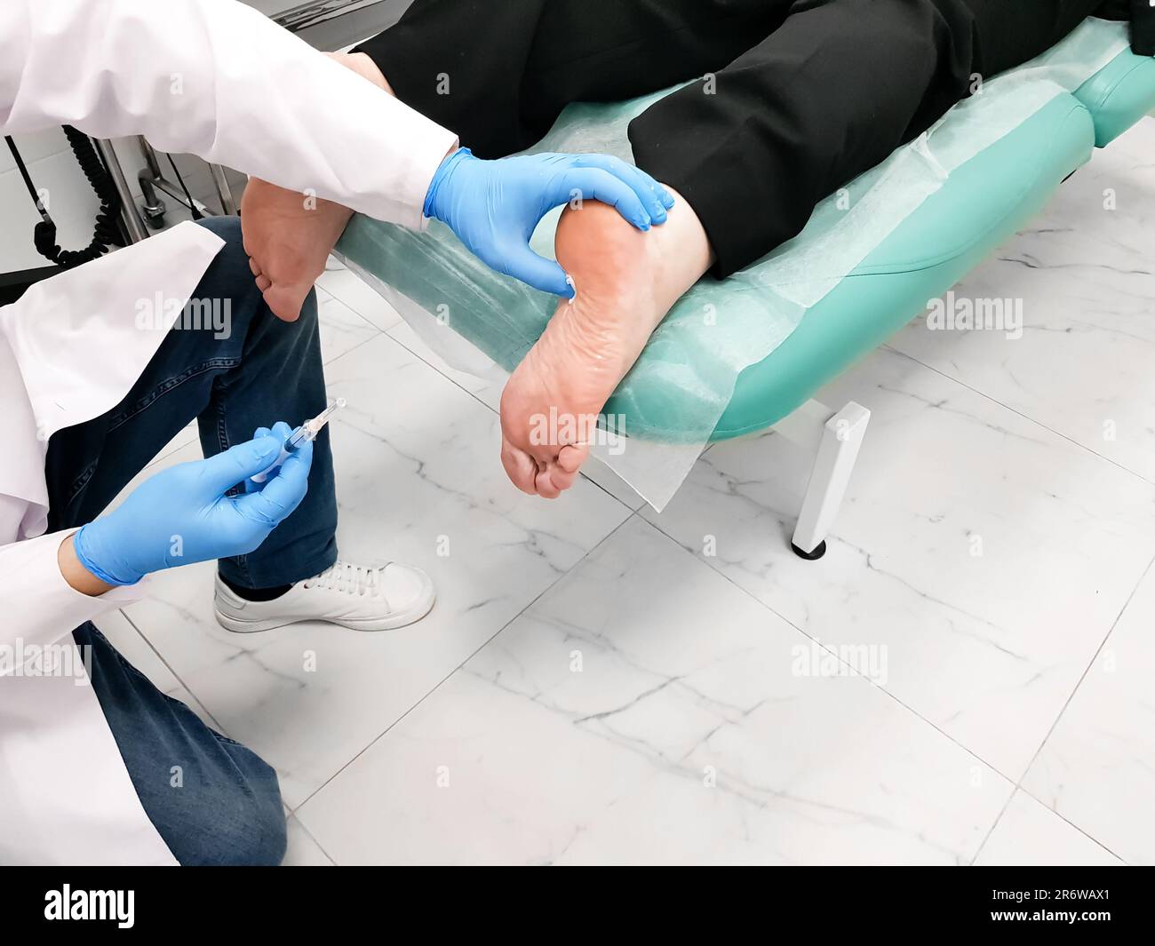 Doctor makes injection medical blockade of hormonal drugs of ...