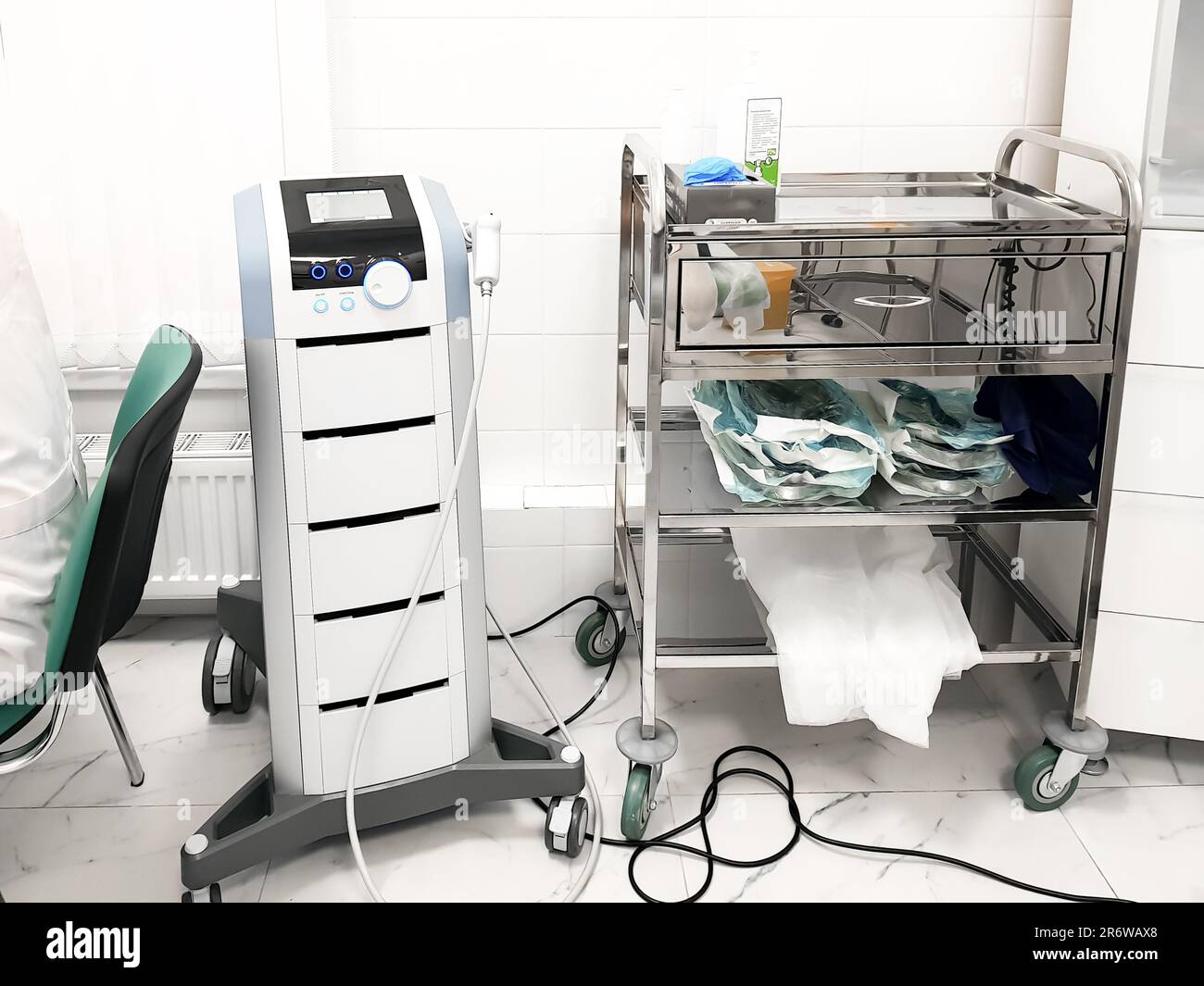 Extracorporeal shock wave therapy ESWT of heel. Visit to office of ...