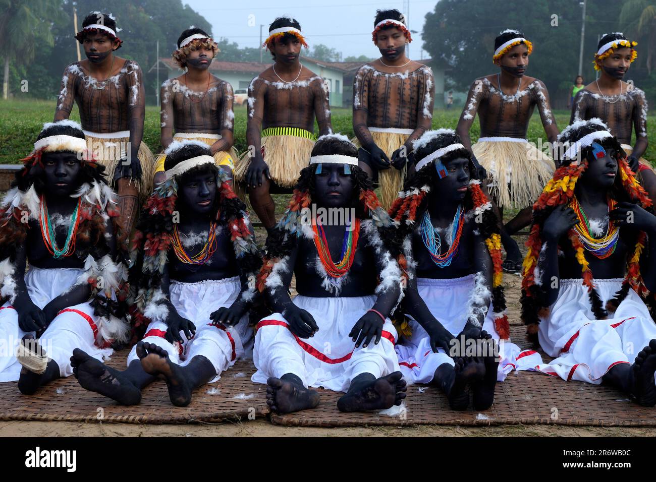 Indigenous girls and boys prepare to take part of a ritual during the ...