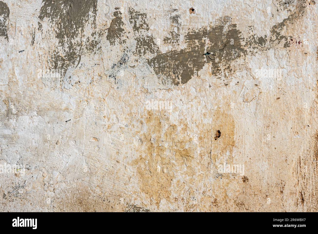 A weathered wall with an aged texture, providing a great backdrop for ...