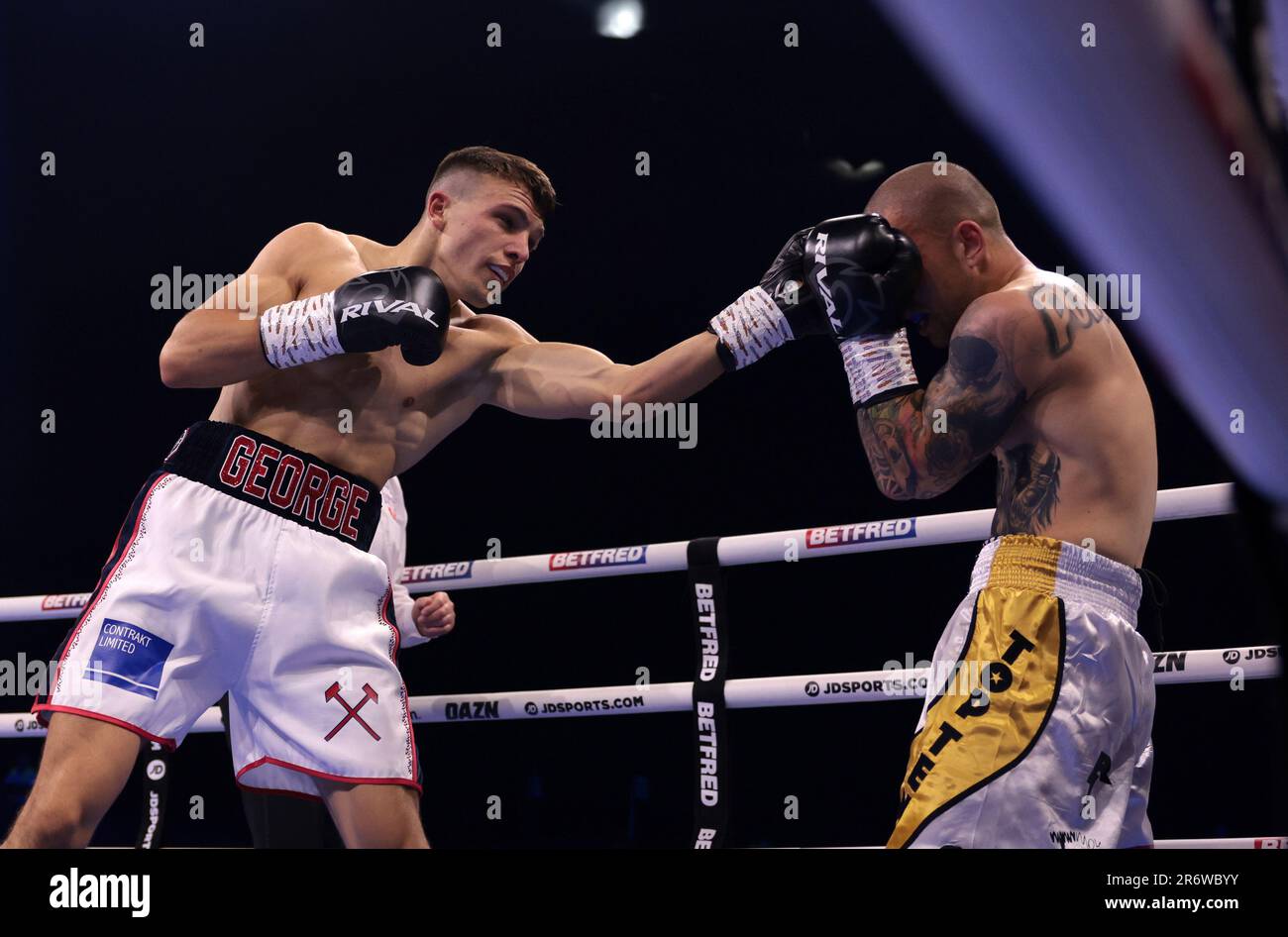 George Liddard (left) hits out at Nikolas Dzurnak during International ...