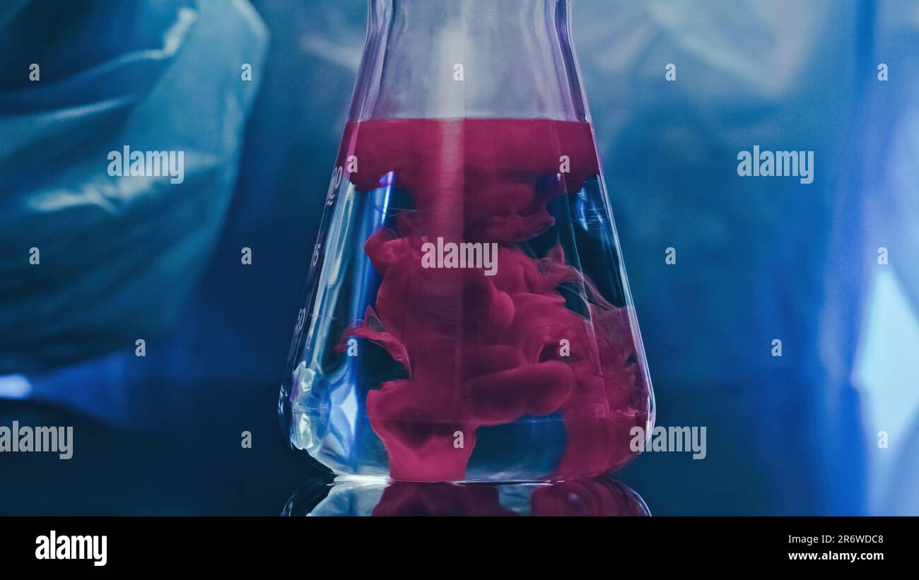 Chemical reaction laboratory technician substance Stock Photo - Alamy