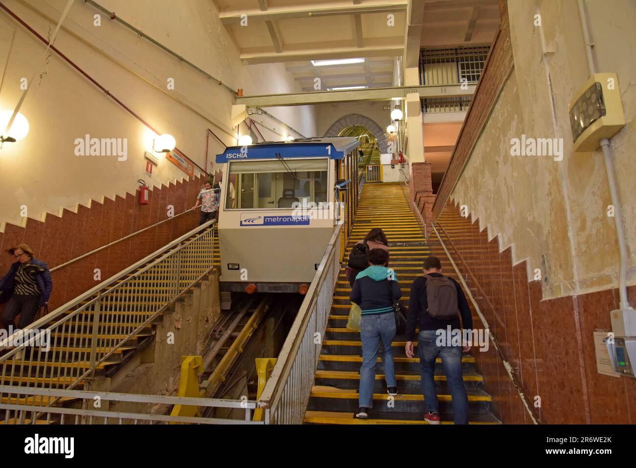 Passengers getting on the train at the lower station of the Mergellina ...