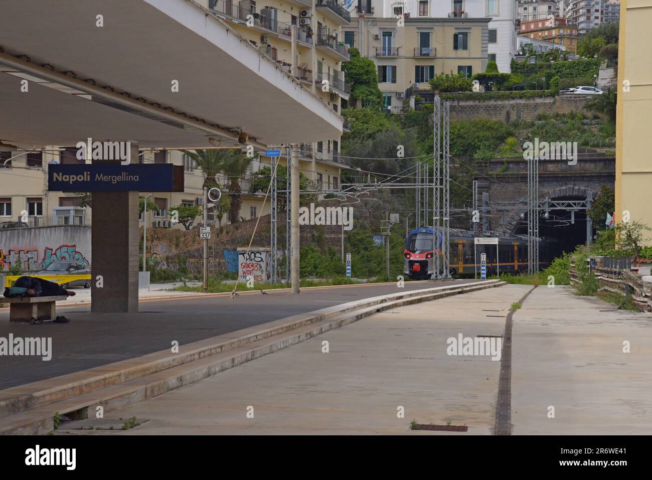 A Trenitalia regional train arrives at the historic Napoli Mergellina ...