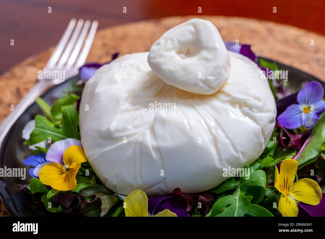 Fresh handmade soft Italian cheese from Puglia, white ball of burrata ...