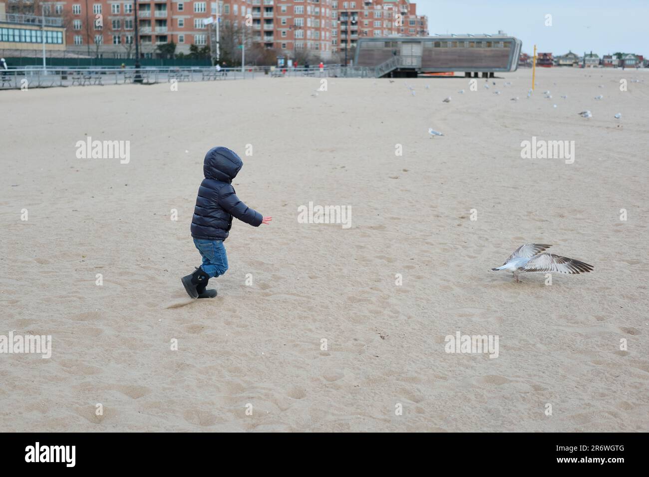 Girl chasing boy hi-res stock photography and images - Alamy